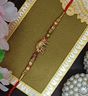Buy Gullak Antique Gold Elephant Rakhi Online - Price @ ₹71 | Instant ...